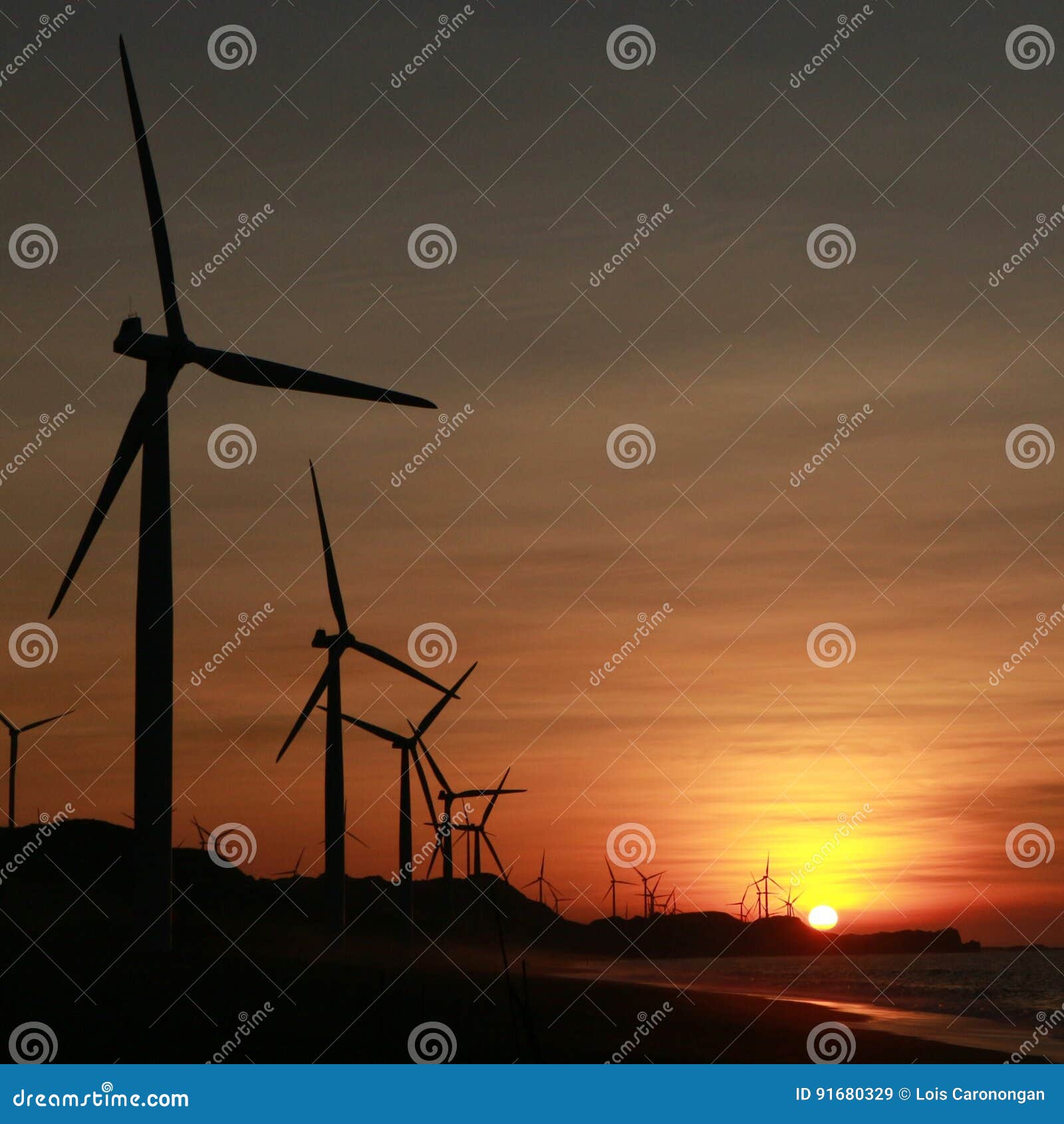 Wind turbines at sunset stock image. Image of place, sunset - 91680329