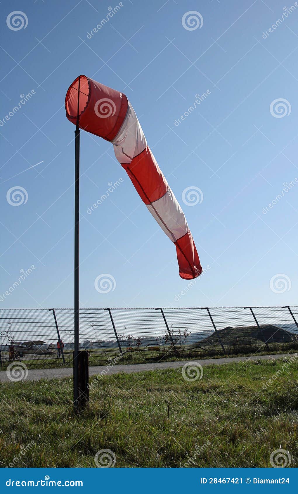 Wind Vane at the Airport and Blue Background Stock Image - Image of ...