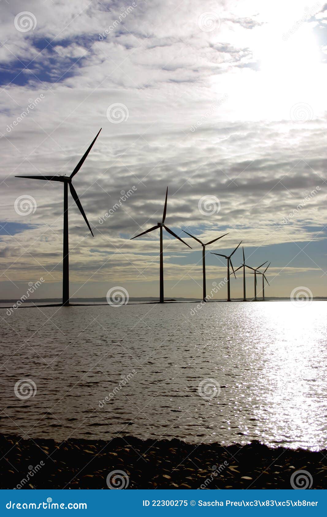 Wind wheels in the ocean stock image. Image of rotor - 22300275