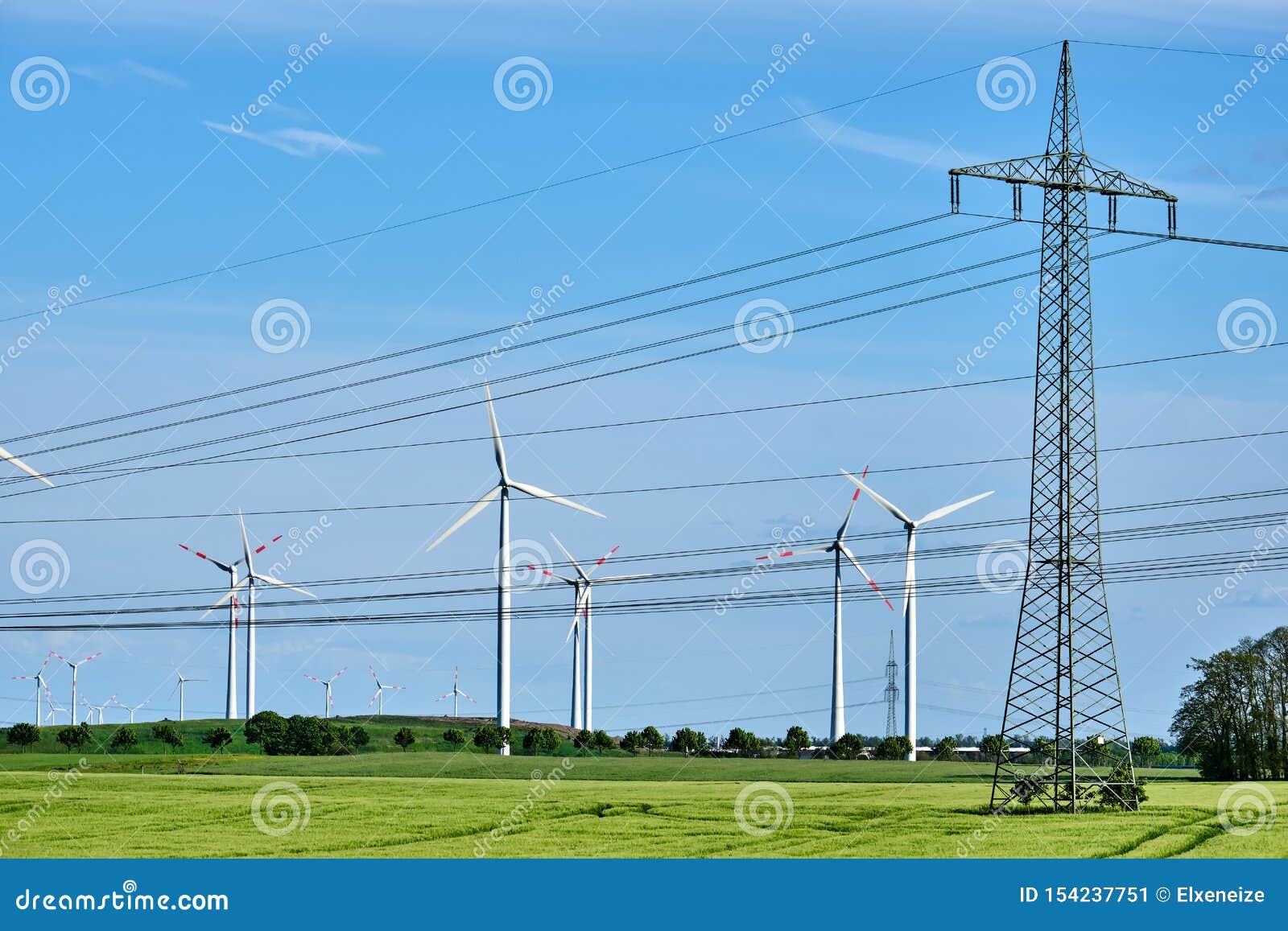 Wind Wheels and Power Lines Stock Image - Image of energy, plant: 154237751
