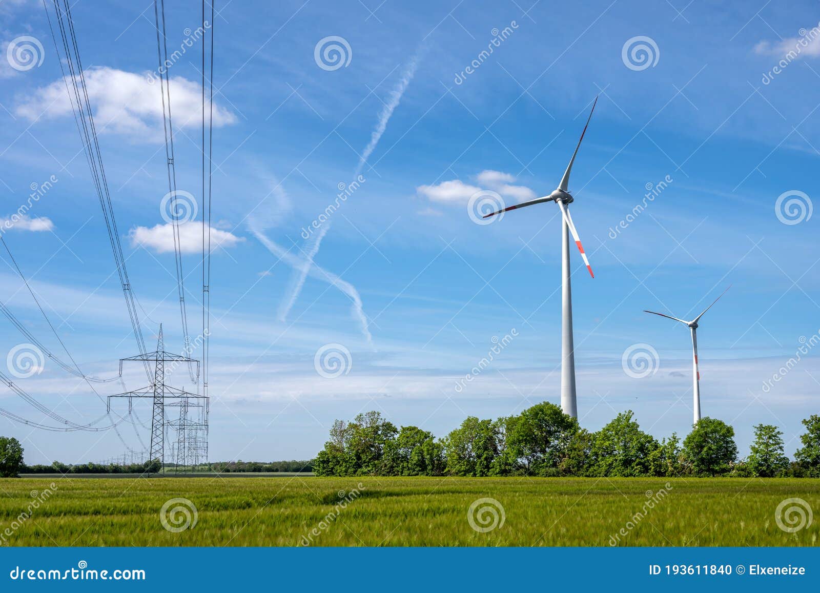 Wind Wheels and Power Lines Stock Photo - Image of cornfield ...