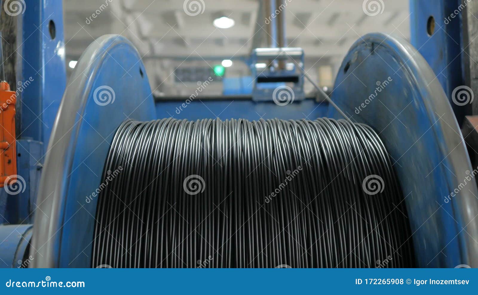 Winding Cable on a Rotating Coil. Production of Electric Cable. Stock ...