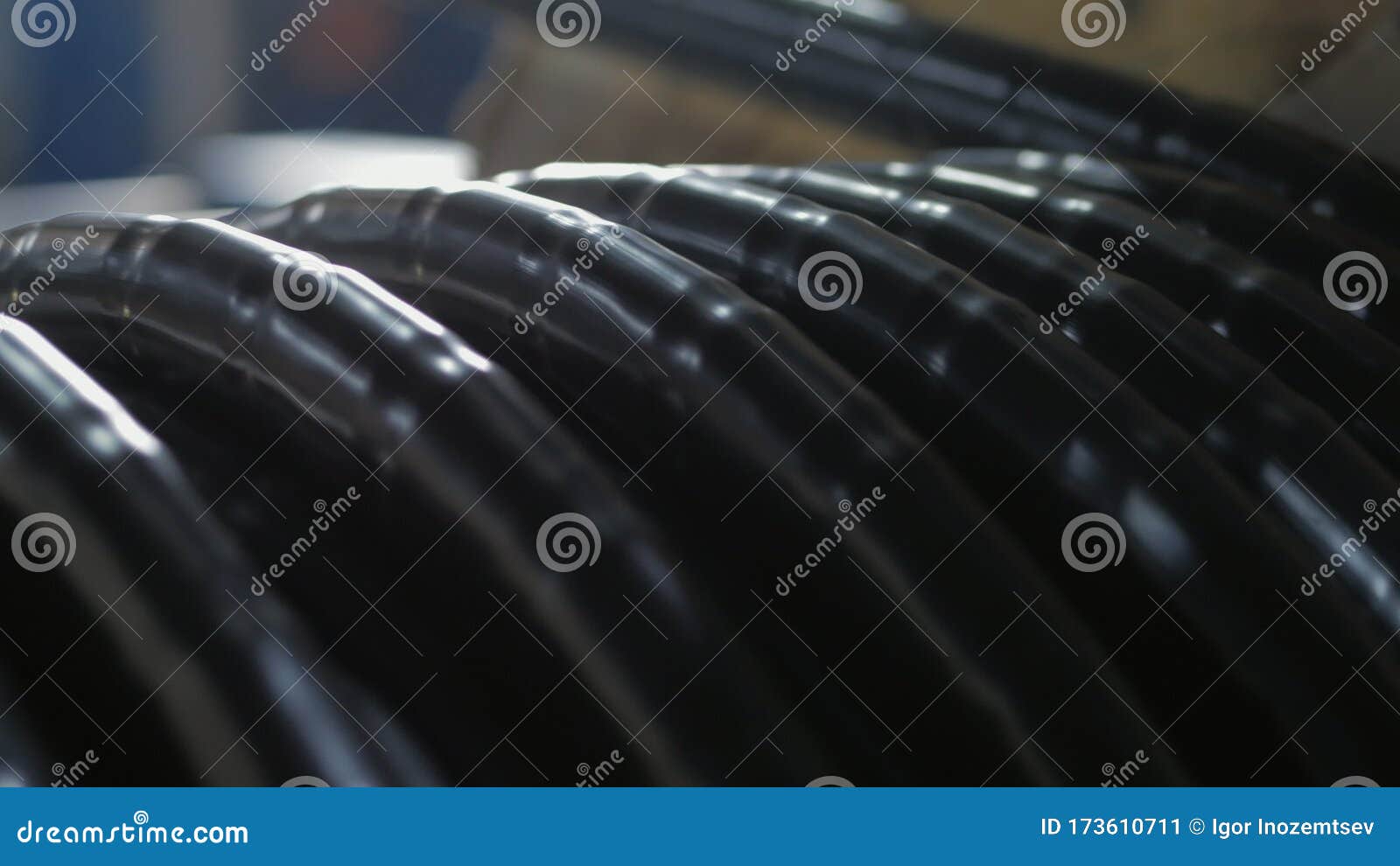 Winding Cable on a Rotating Coil. Production of Electric Cable. Stock ...