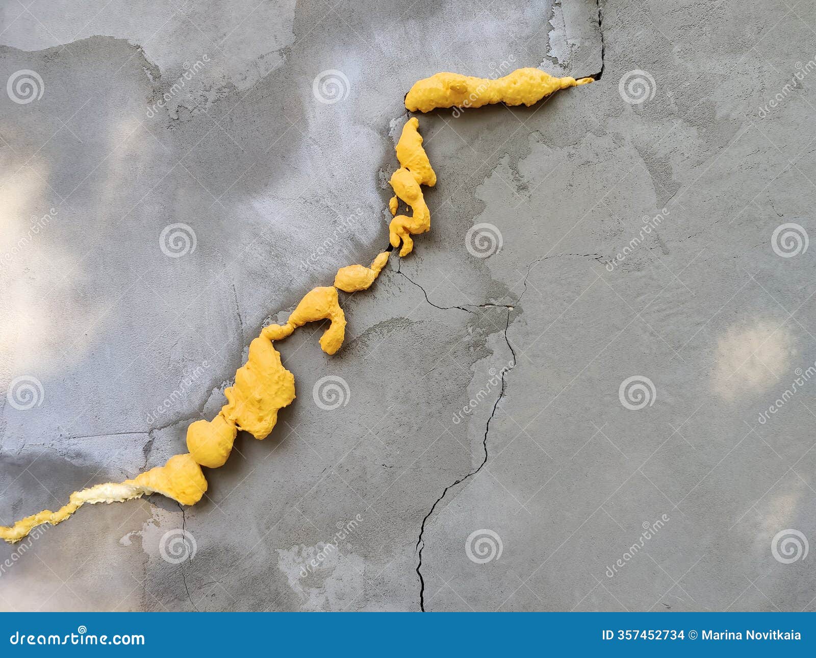 Winding Crack in Plastered Concrete Gray Wall Sealed with Yellow ...