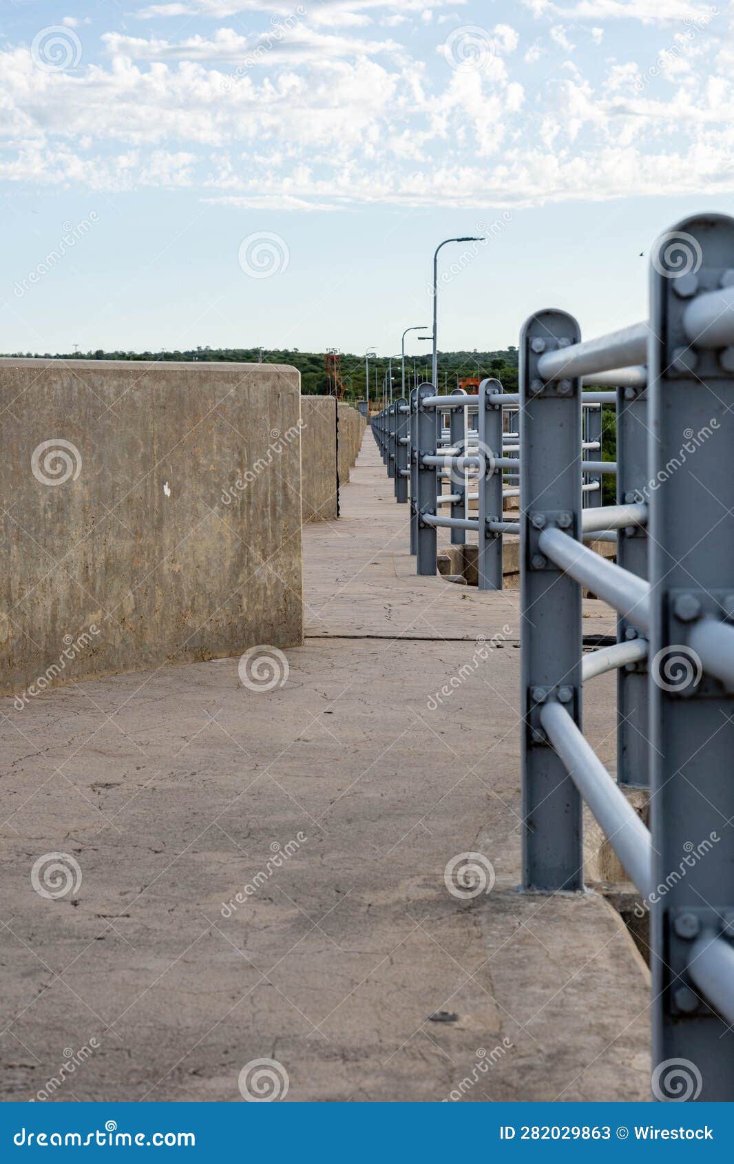 Winding Curvy Pathway Lined with a Metallic Fence Stock Image - Image ...