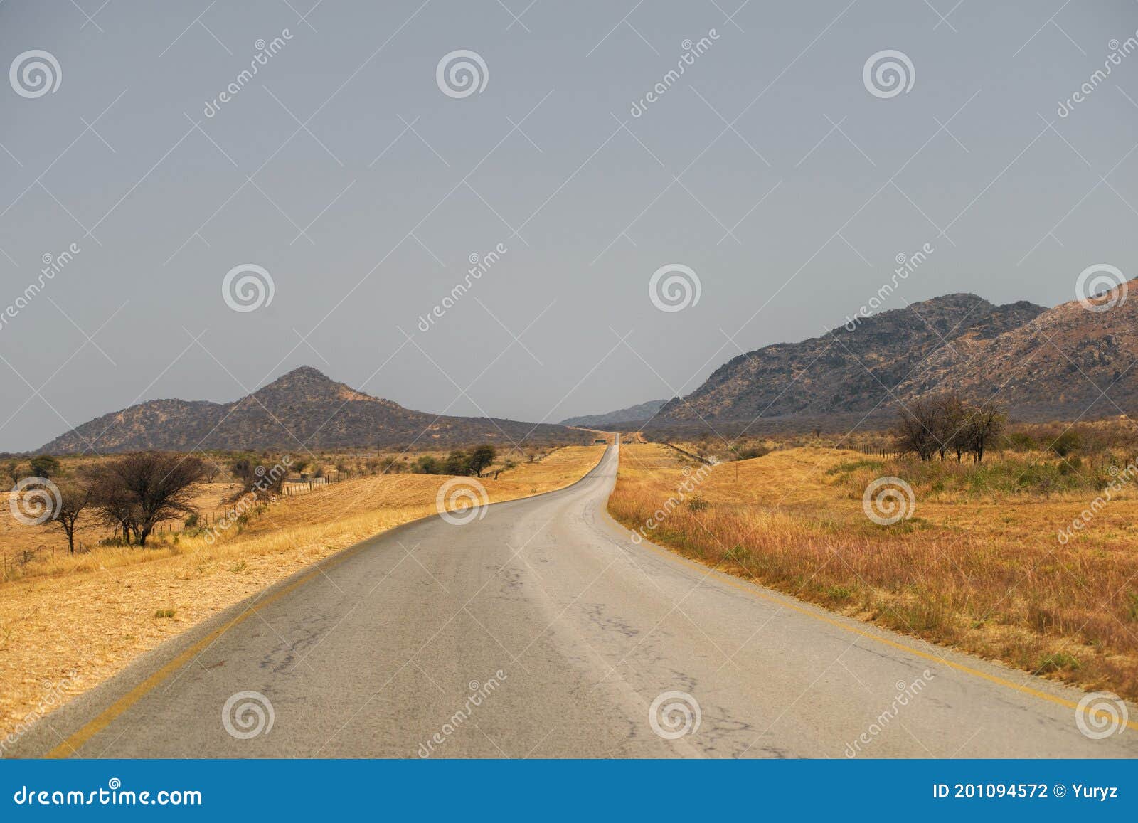 Winding highway in Namibia stock photo. Image of blue - 201094572