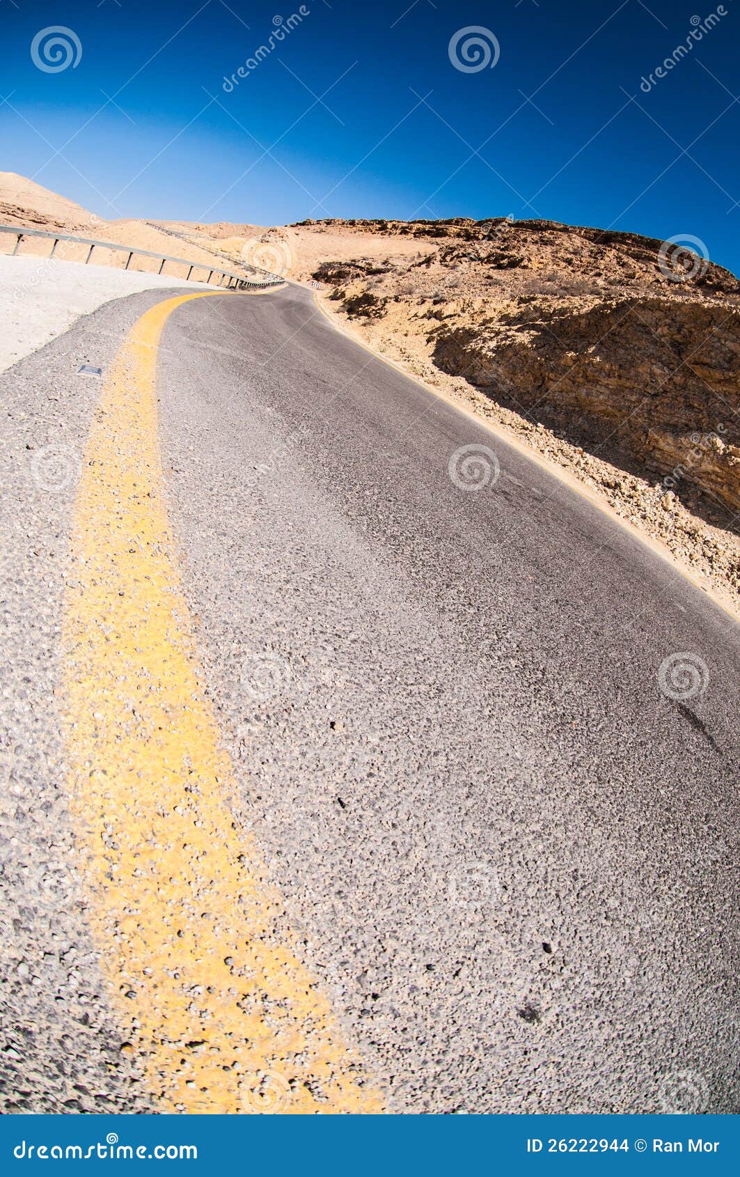 Winding road in the desert stock photo. Image of open - 26222944