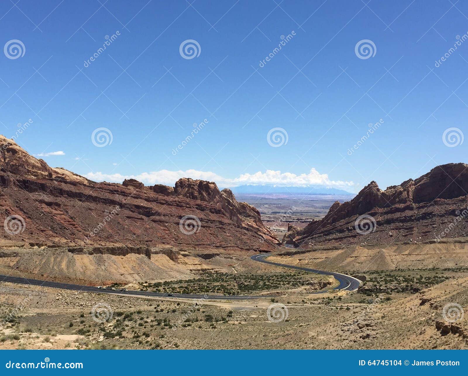 Winding Road in the desert stock photo. Image of outdoors - 64745104