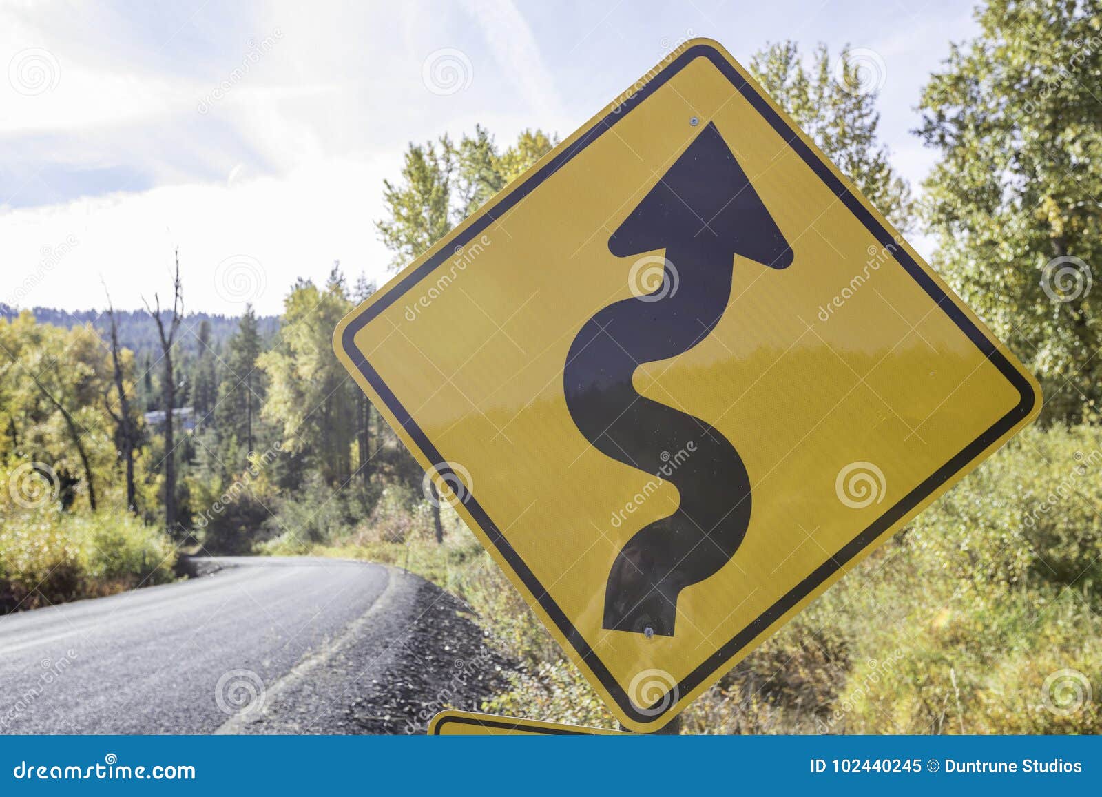 Winding Road Sign stock image. Image of curvy, arrow - 102440245