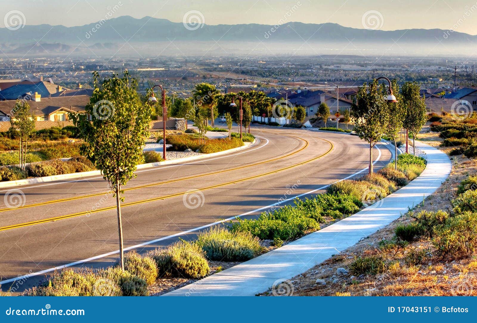 Winding Road in the Suburb stock image. Image of winding - 17043151