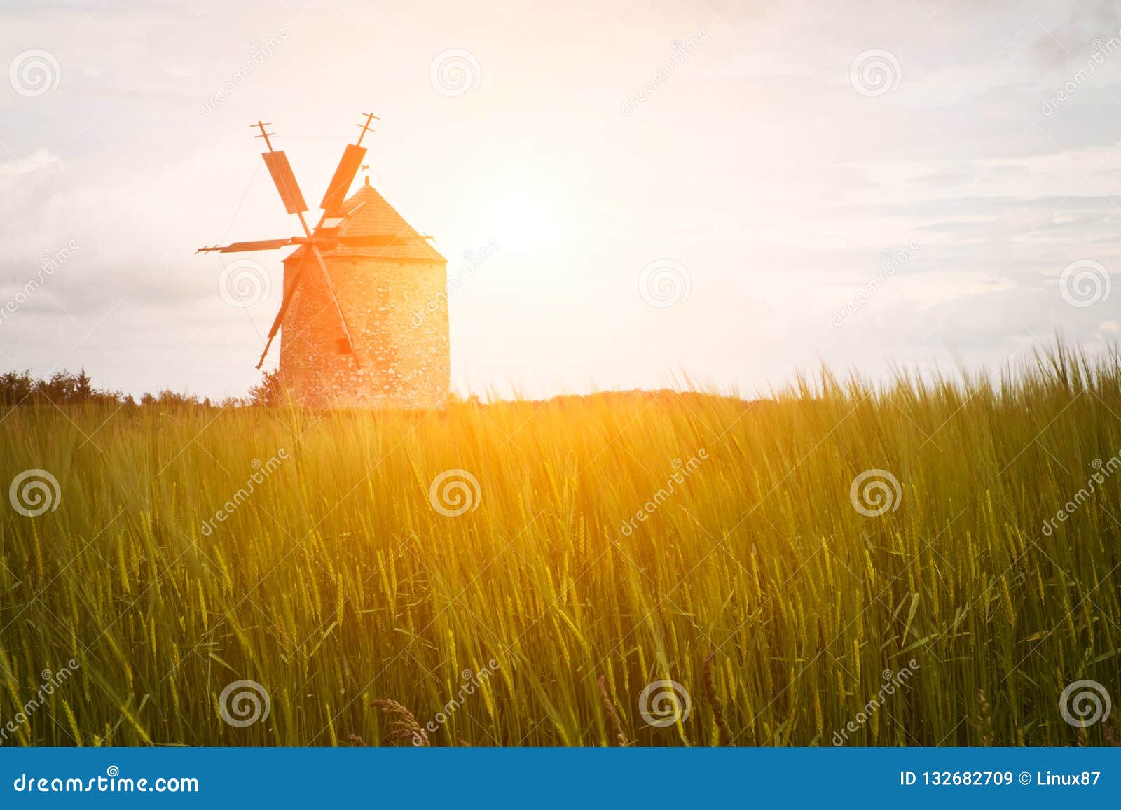 Windmill on wheatfield stock image. Image of ancient - 132682709