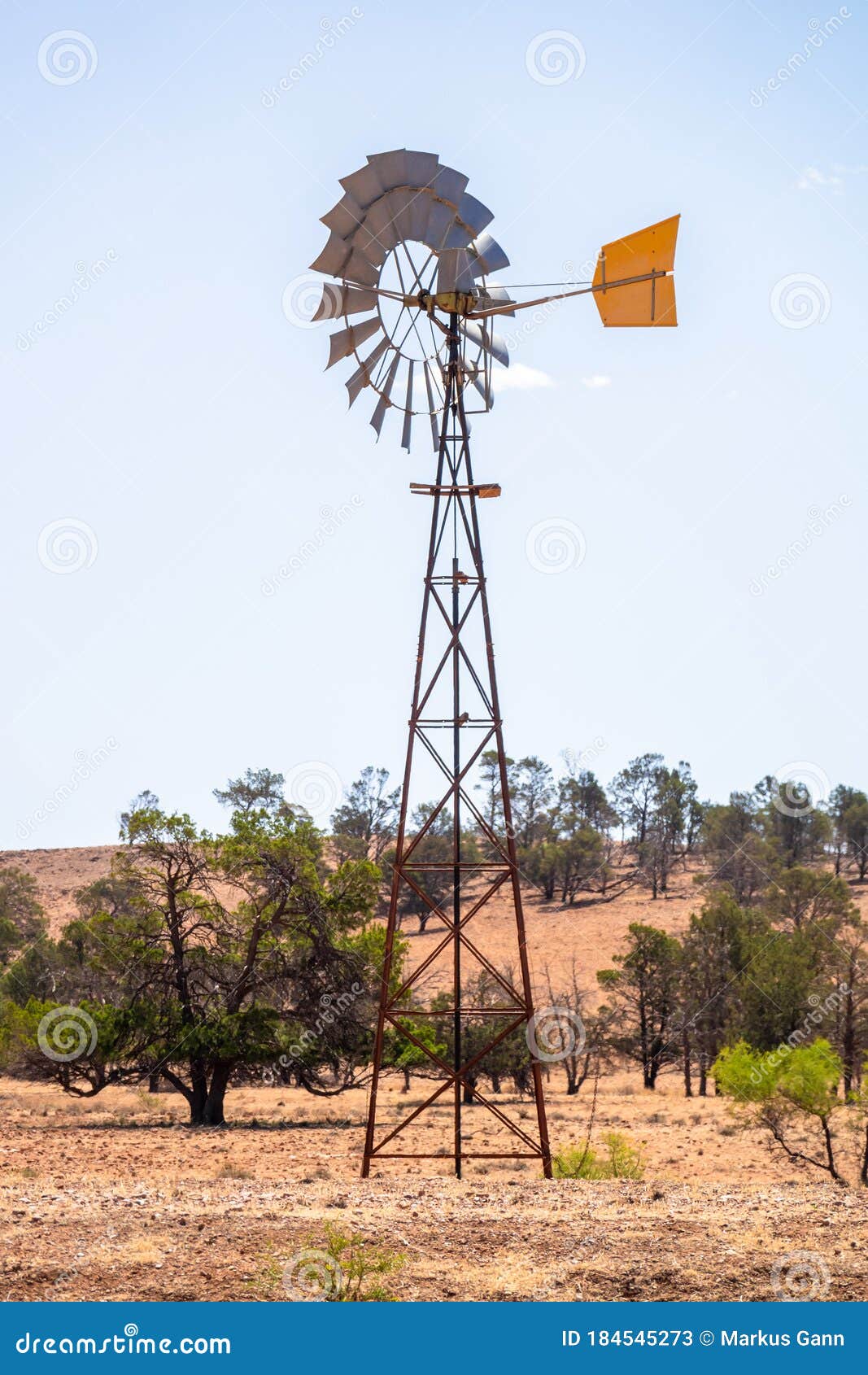 Windmill in australia stock image. Image of country - 184545273