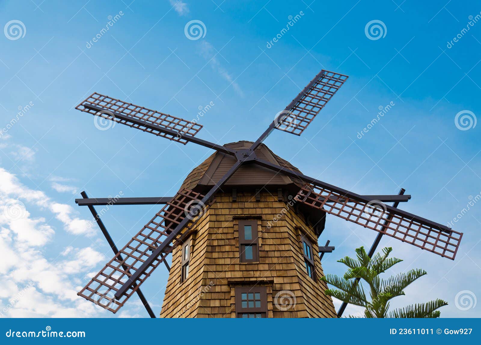 Windmill in the blue sky stock image. Image of exterior - 23611011
