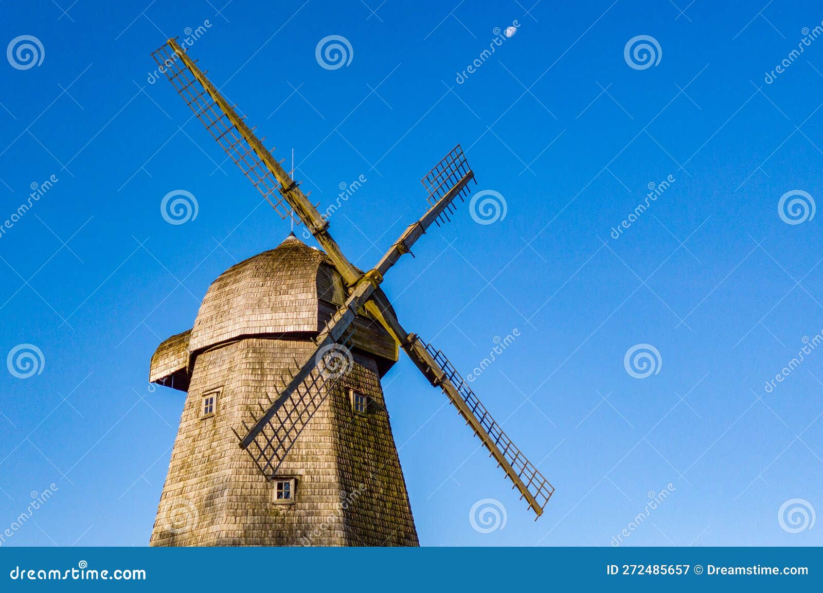 Windmill with Blue Sky with Moon in Background. Stock Image - Image of ...