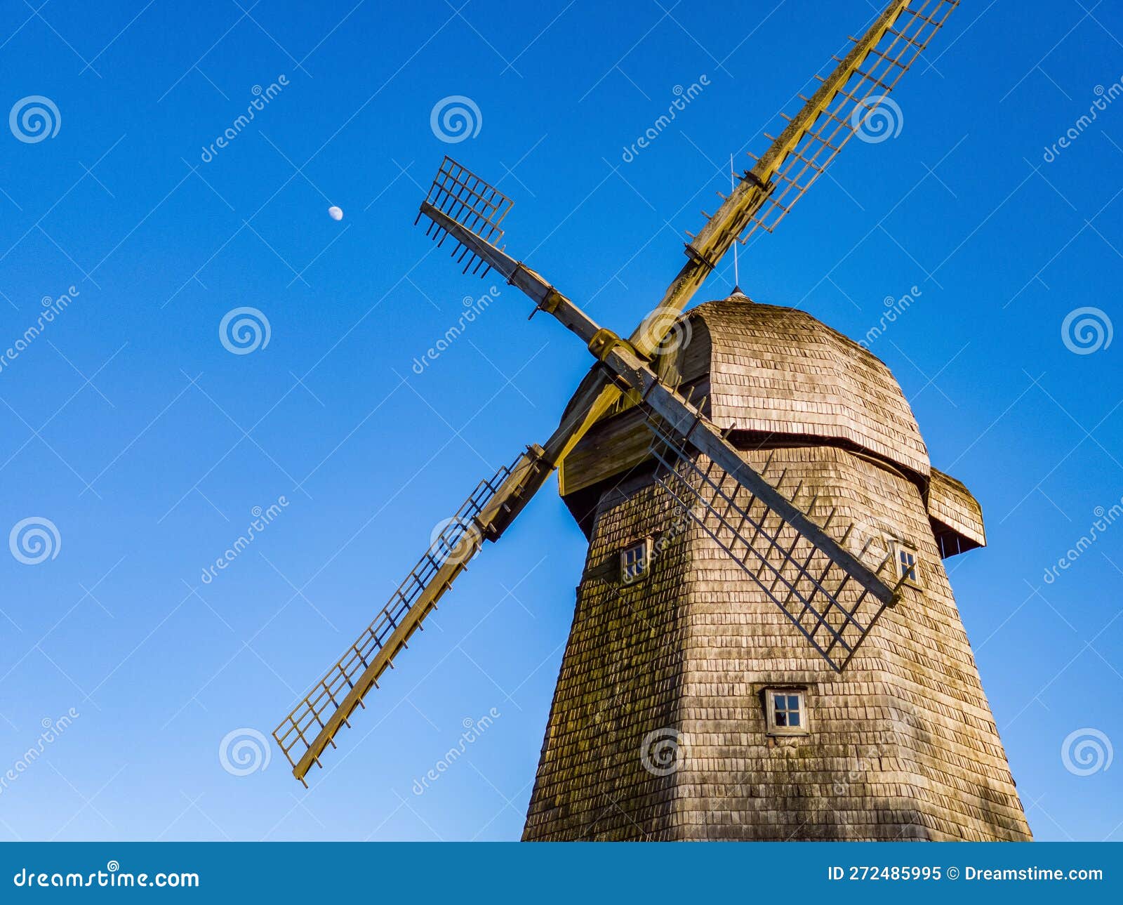 Windmill with Blue Sky with Moon in Background. Stock Image - Image of ...