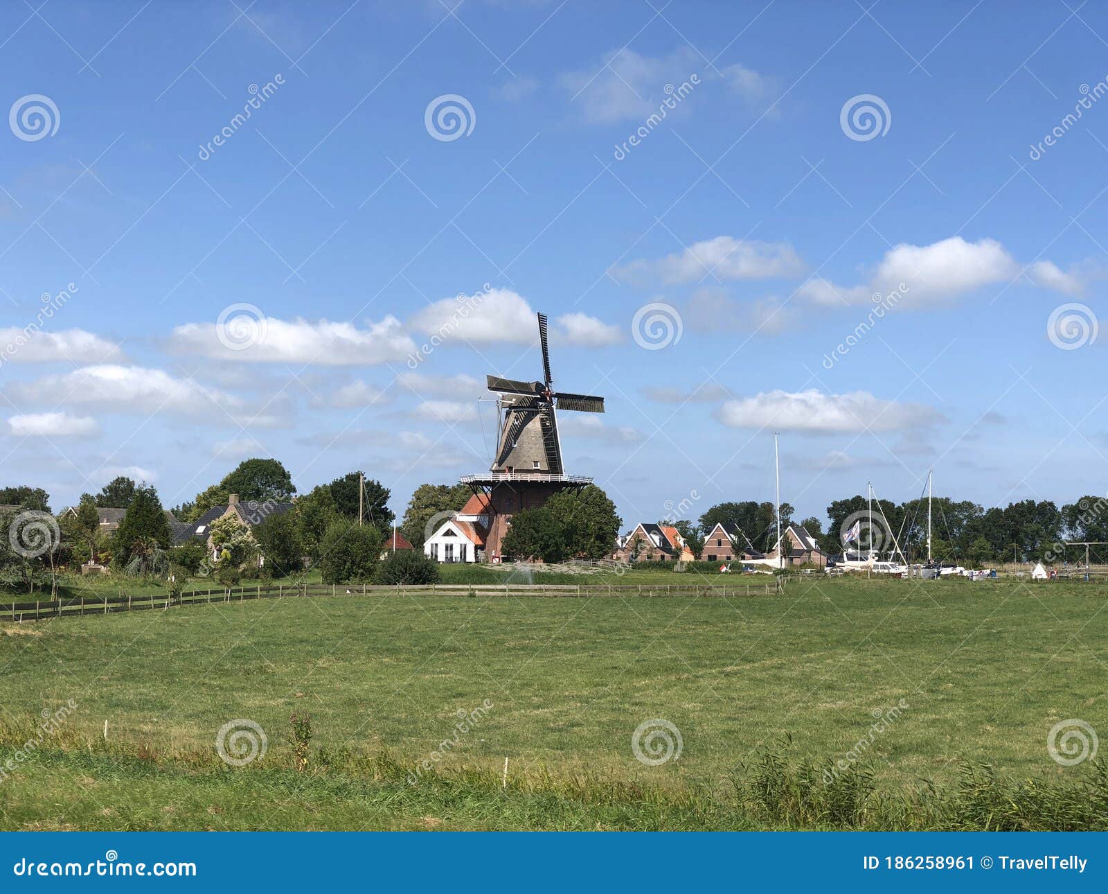 Windmill in Burdaard stock image. Image of landscape - 186258961