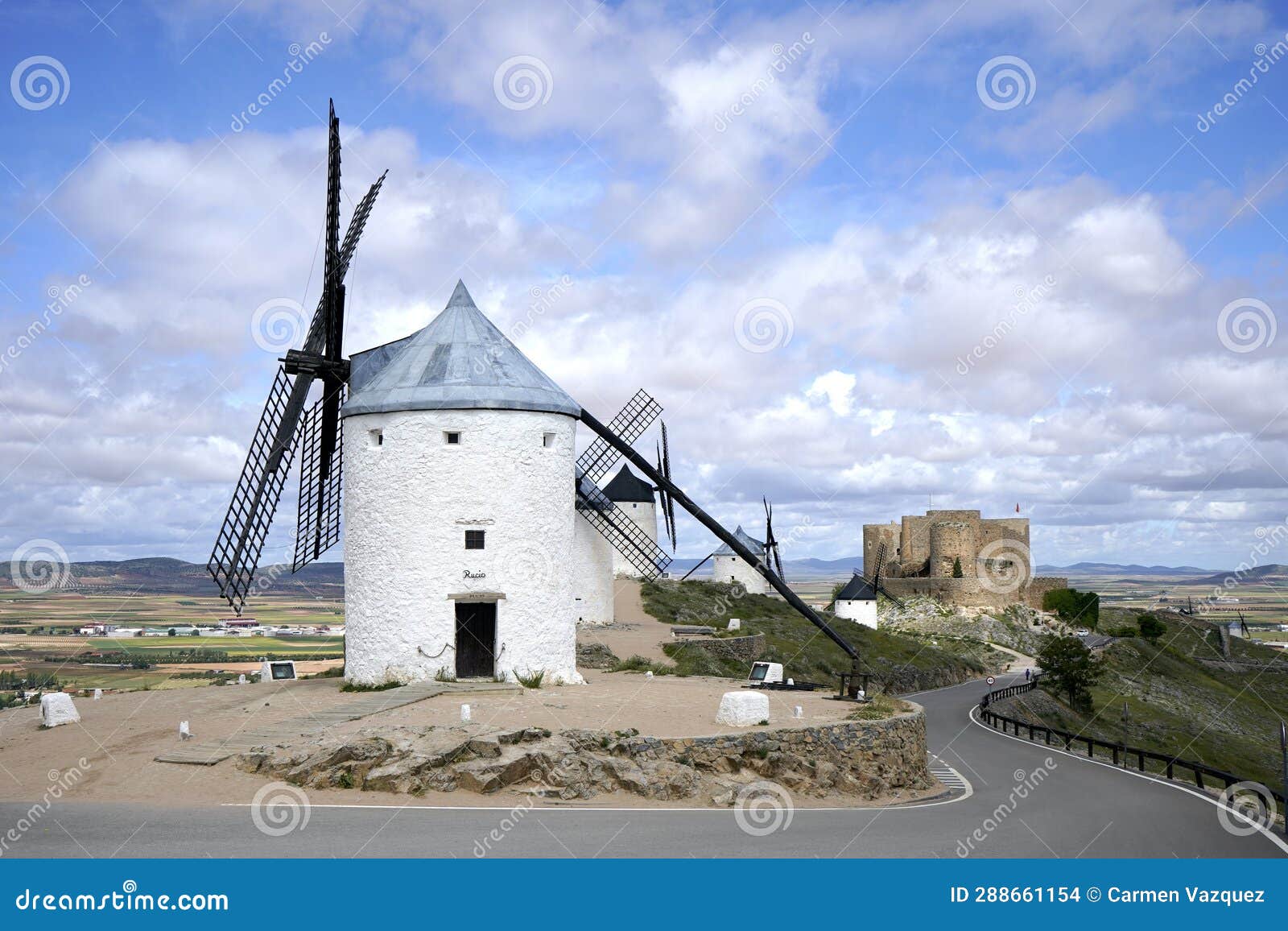 Windmill and castle stock photo. Image of tower, toledo - 288661154