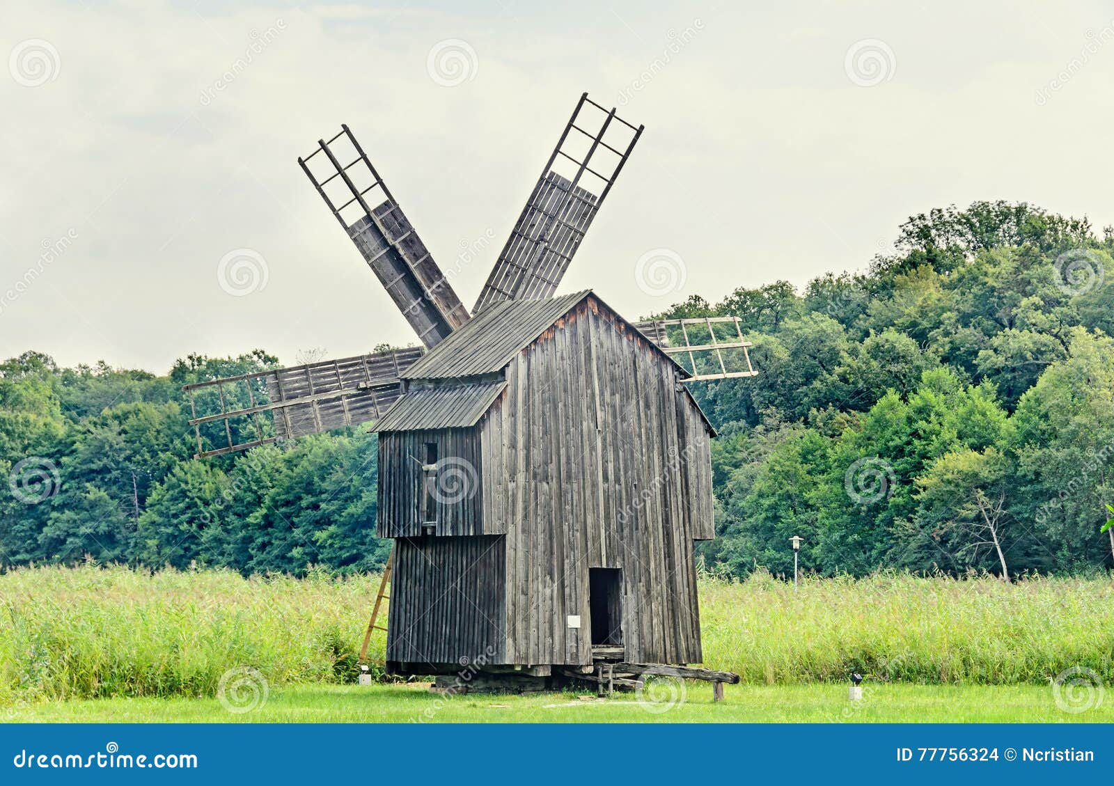 Windmill Close Up, Green Forest, Wild Vegetation Stock Photo - Image of ...