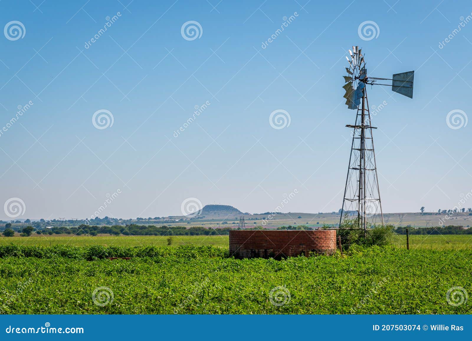 Windmill and Dam stock photo. Image of africa, farming - 207503074
