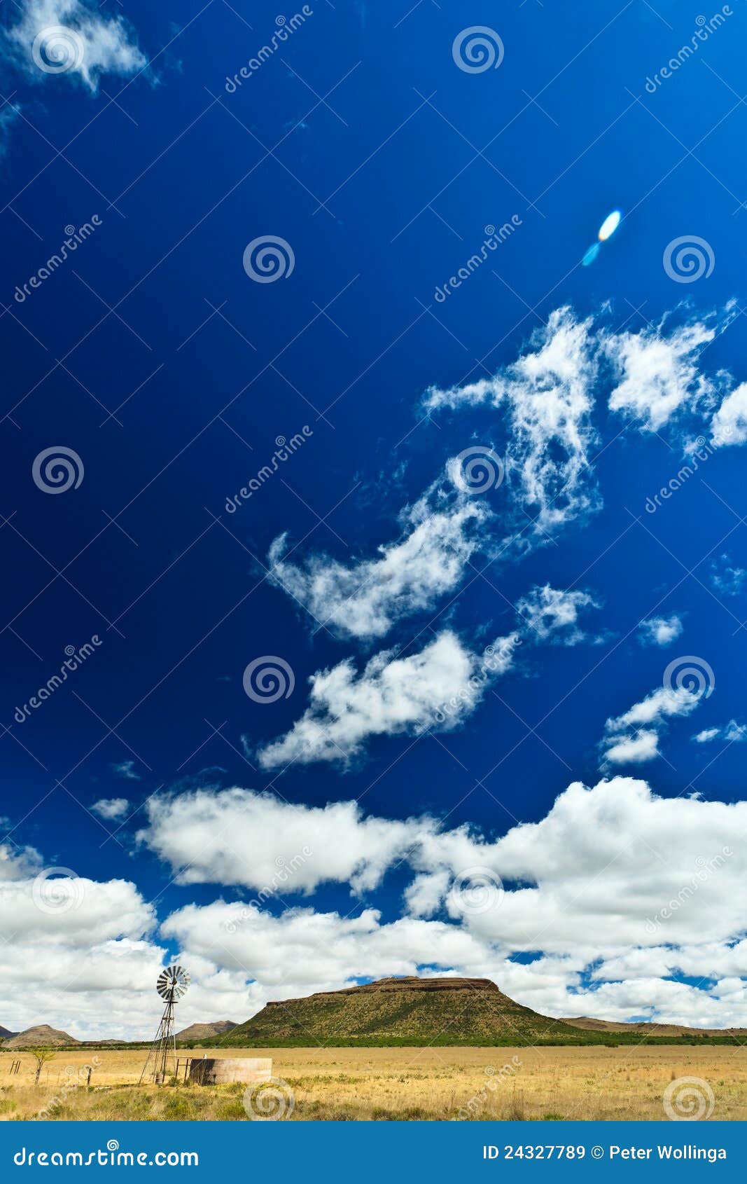 Windmill in a Desolate Landscape Stock Image - Image of background ...