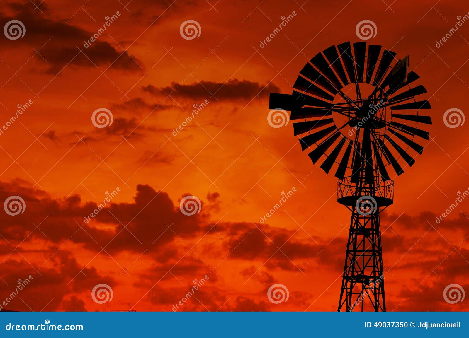 Windmill in the Evening Sky Stock Photo - Image of windmill, rural ...