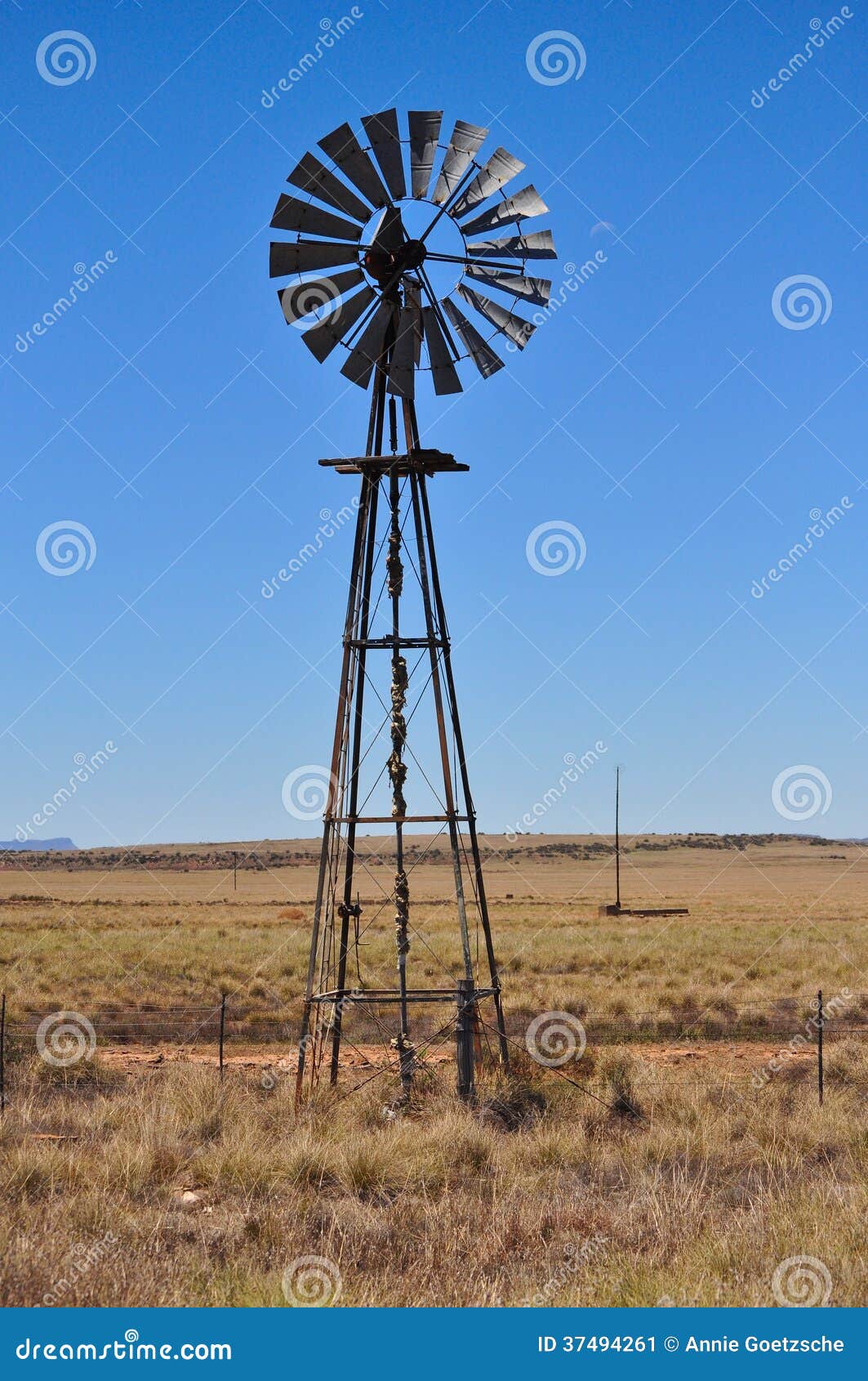 Windmill on farm stock image. Image of africa, land, windmill - 37494261