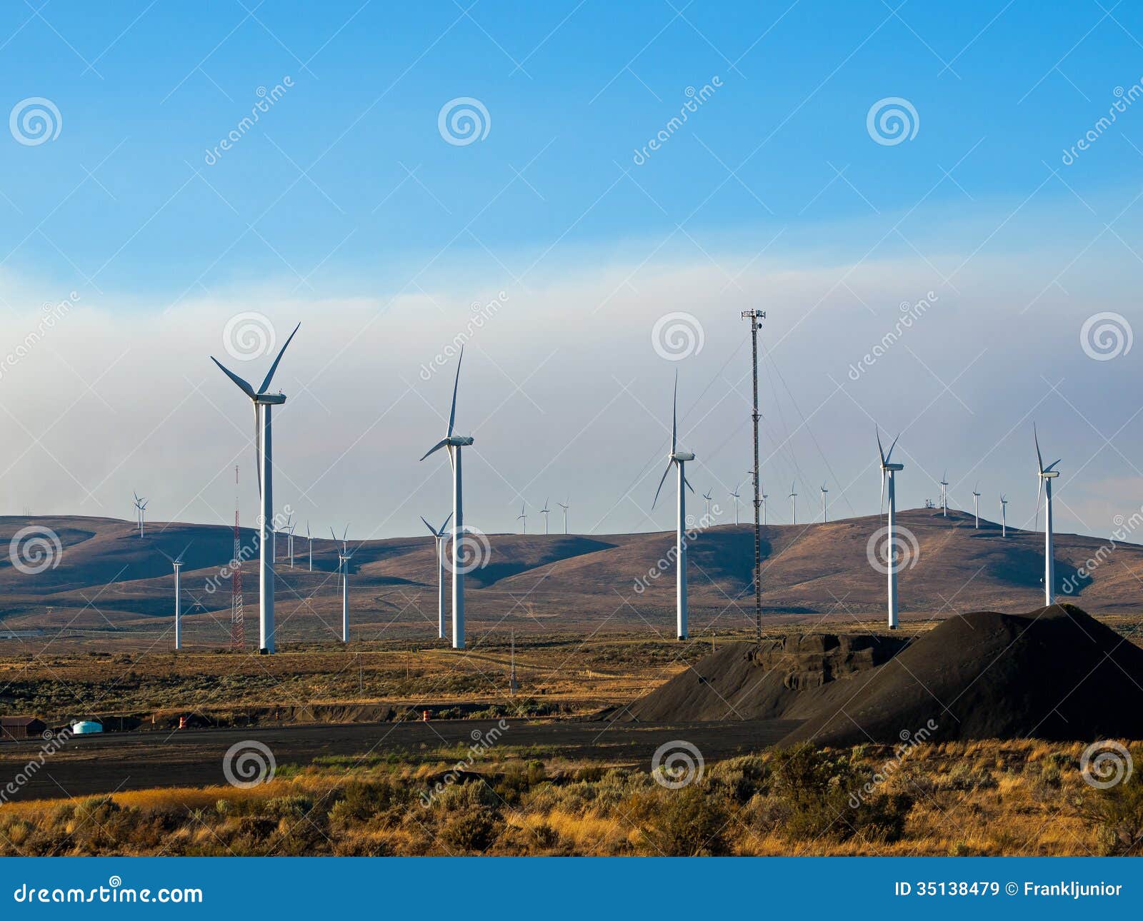 A Windmill Farm on a Mountain Stock Image - Image of mountain, blue ...