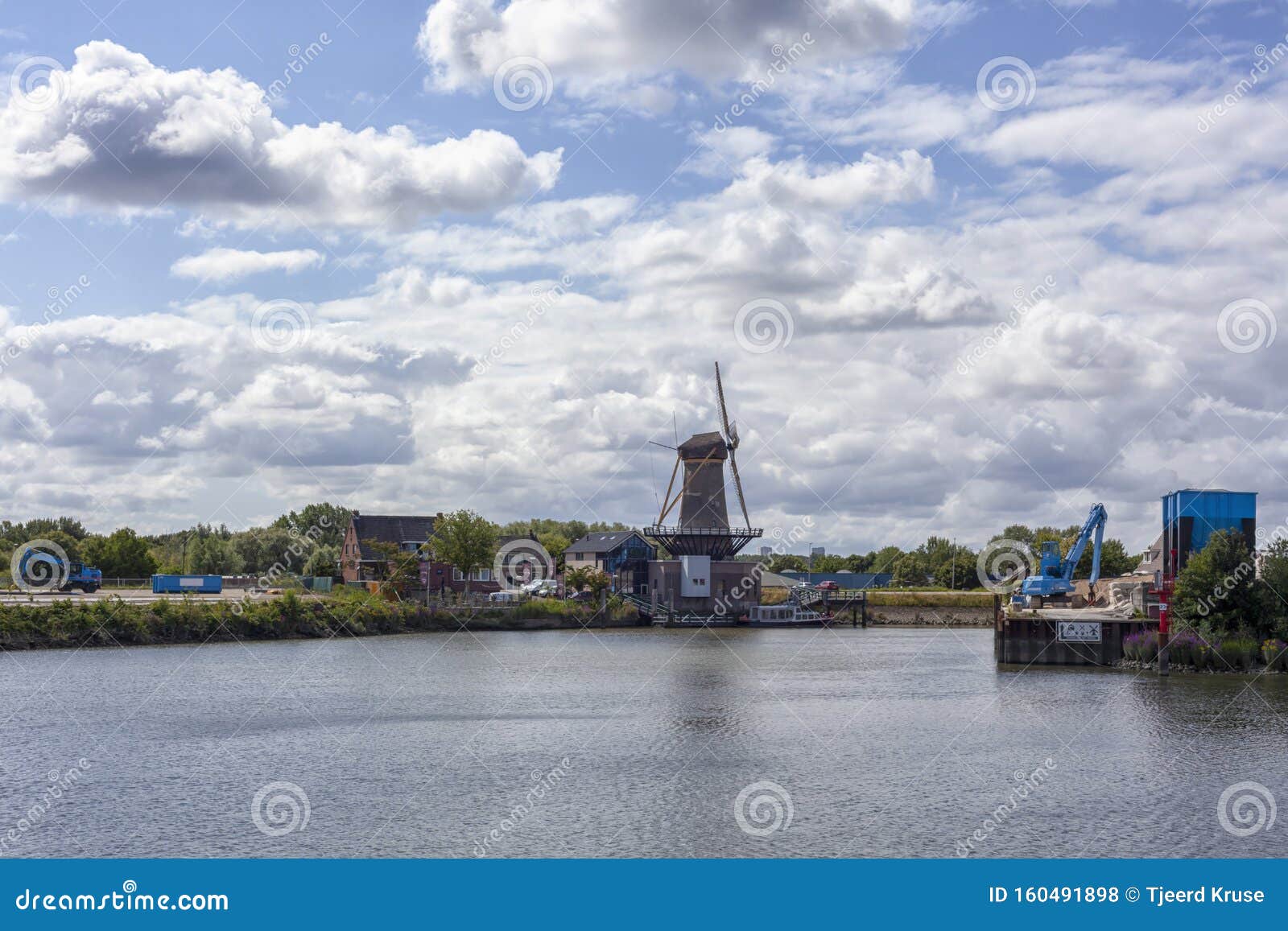 Windmill Farm River Landscape. Windmill Farm Scene. Village Windmill ...