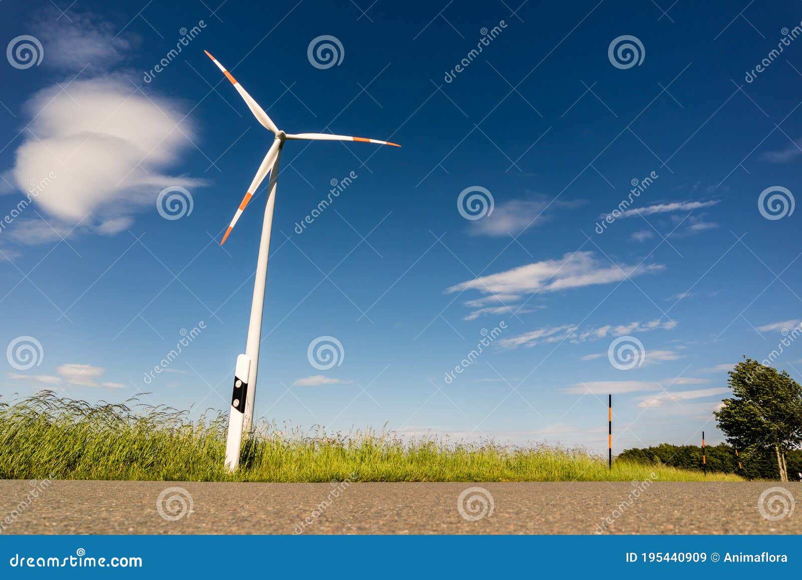Windmill in a Field N a Street Stock Image - Image of cloud ...