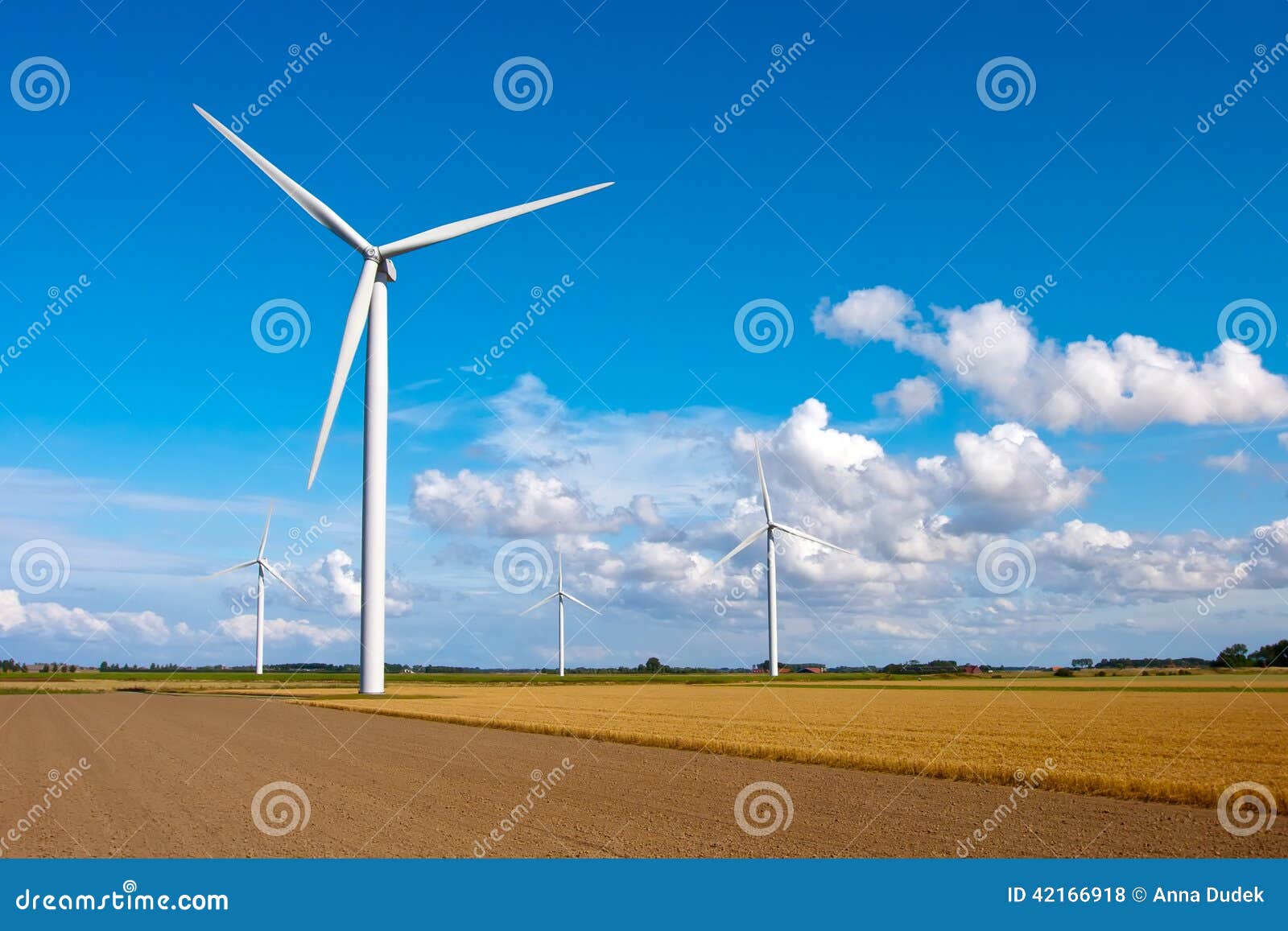 Windmill on a field stock photo. Image of blue, power - 42166918