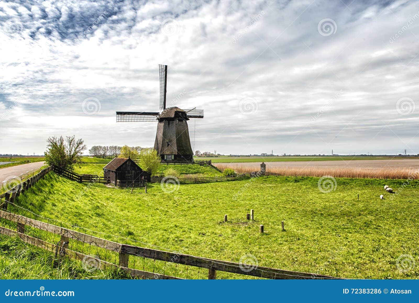 Windmill in a field stock photo. Image of pasture, pump - 72383286