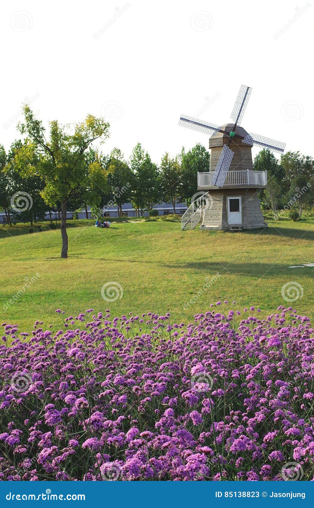 Windmill and flower garden stock image. Image of china - 85138823