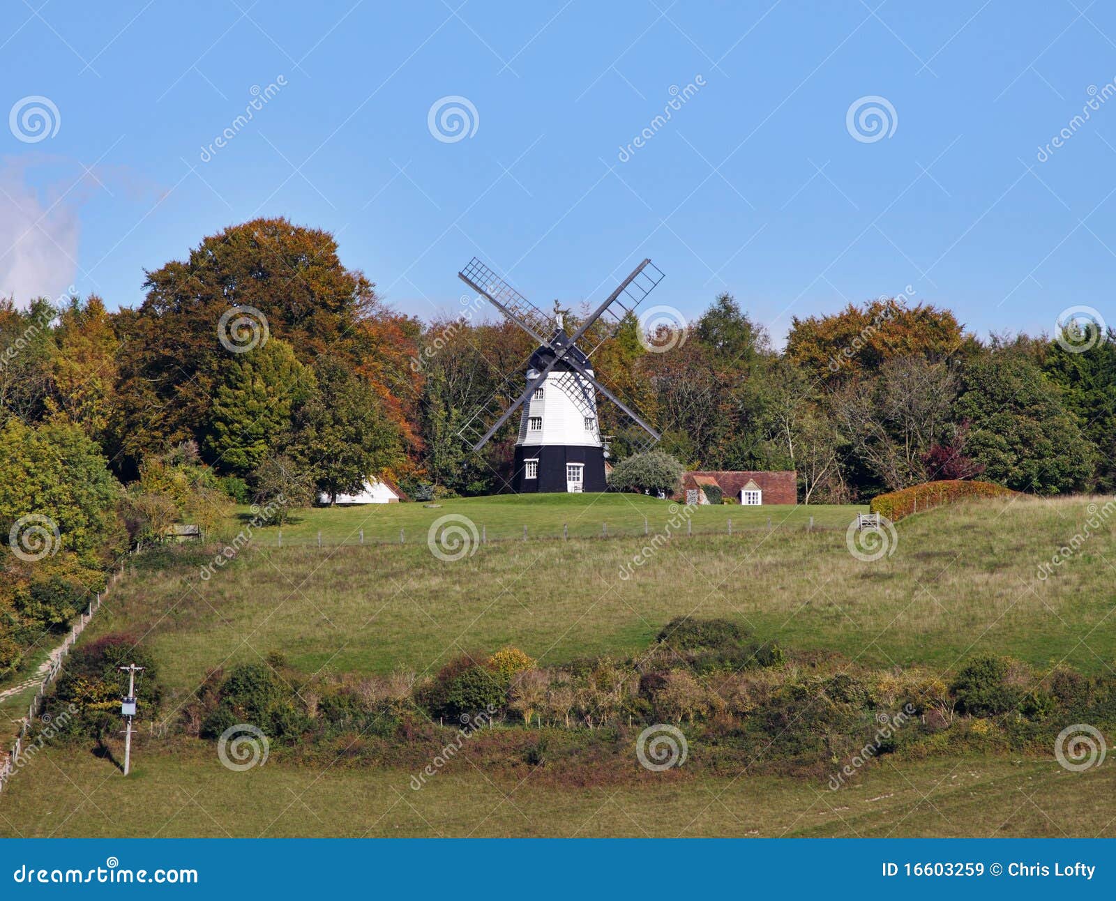 Windmill on a Hill stock image. Image of building, woodland - 16603259