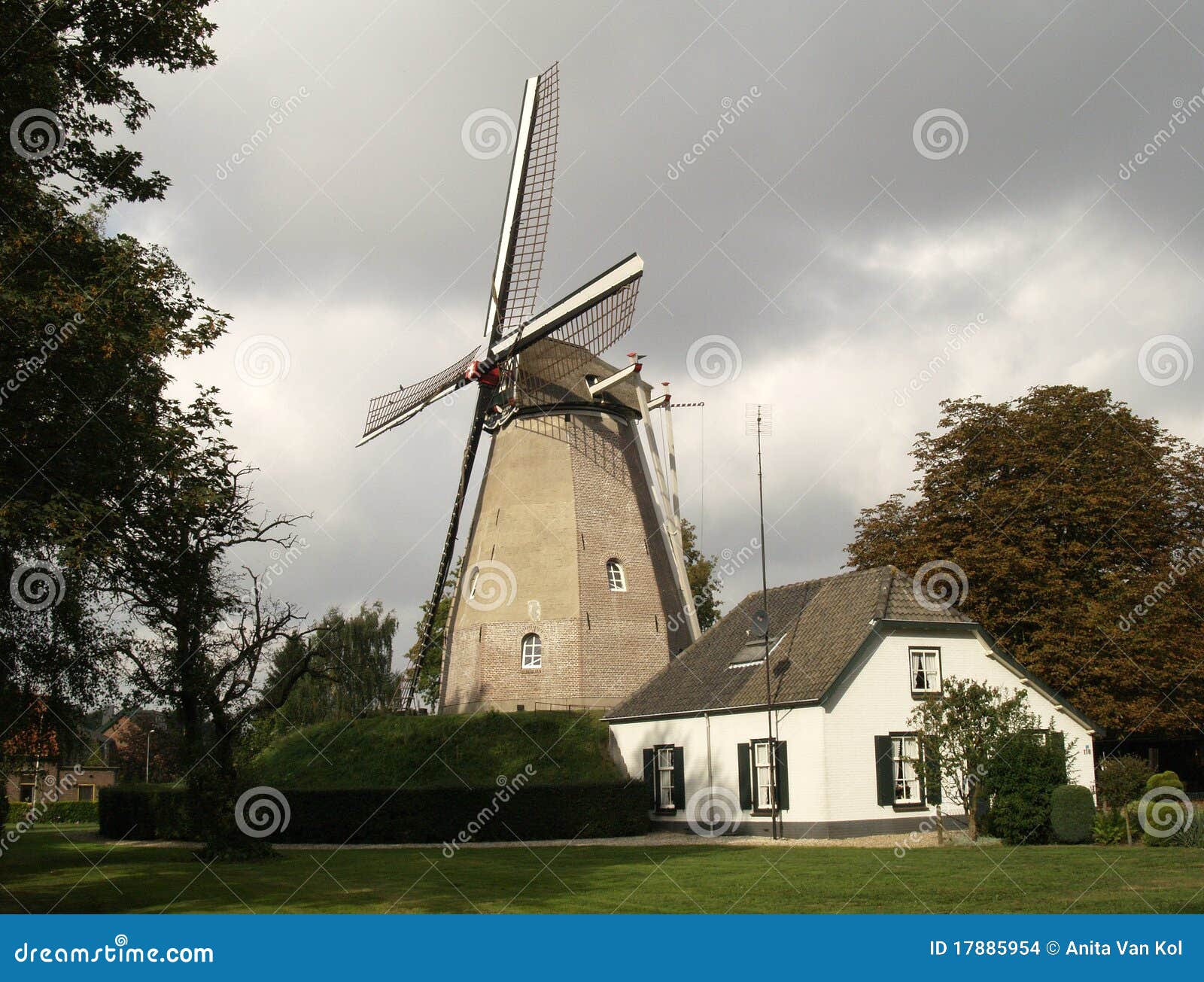 Windmill with little house stock photo. Image of wings - 17885954