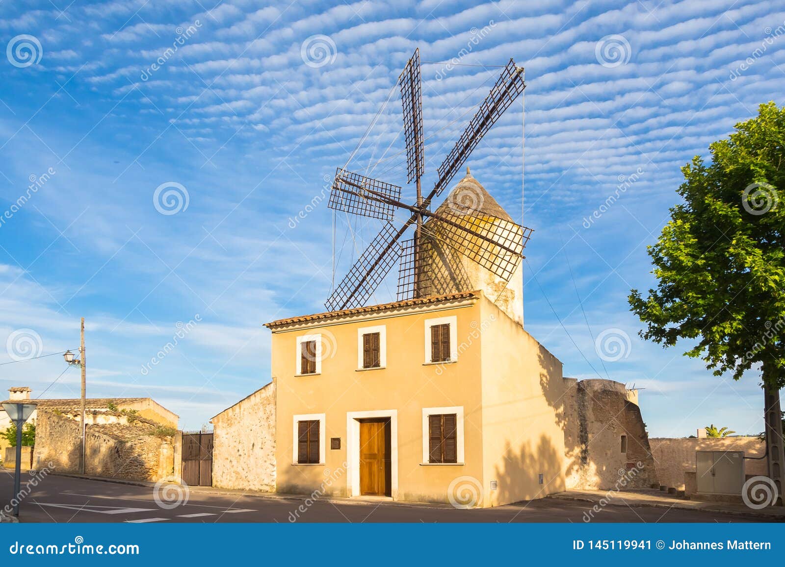 Windmill in Llubi Mallorca stock image. Image of clouds - 145119941