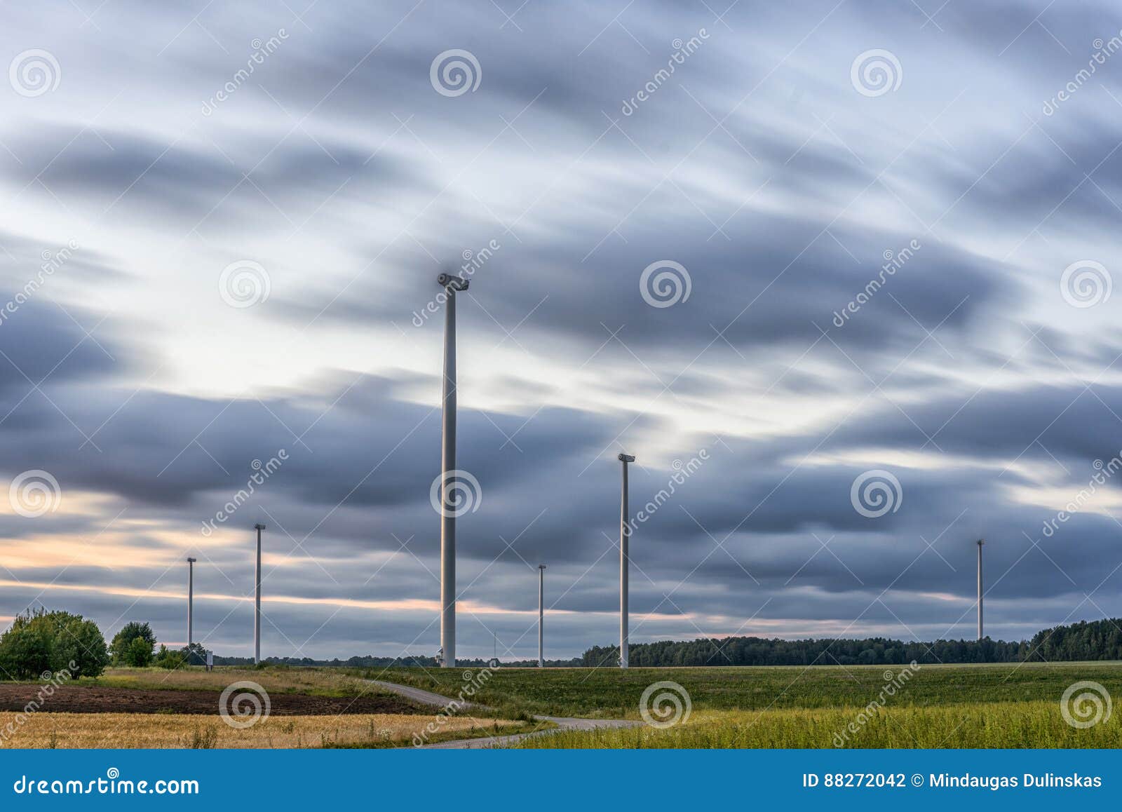 Windmill with Long Exposure Evning Cloudy Sky. Stock Photo - Image of ...