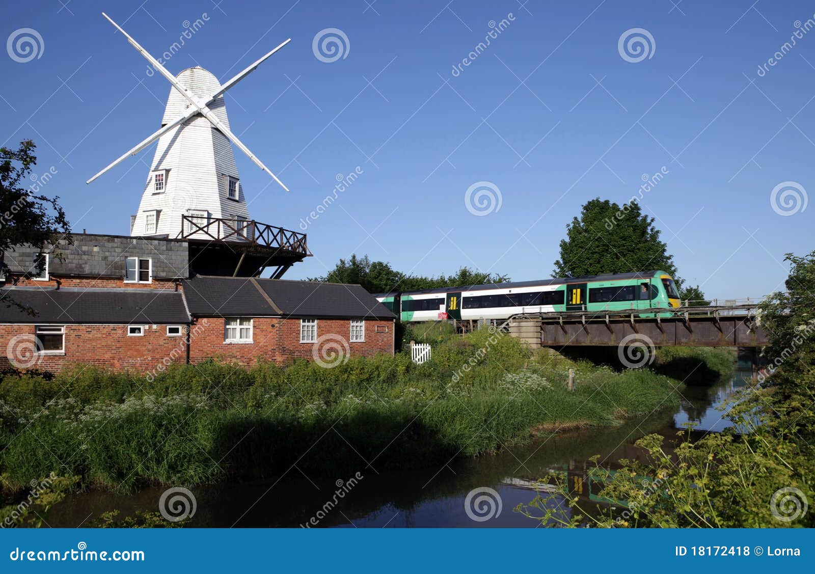 Windmill Mill River England Train Stock Photo - Image of mill, building ...