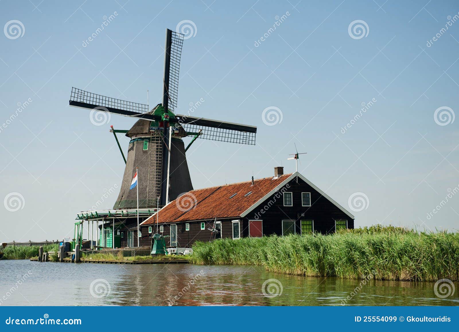 Windmill Near the River at Zaanse Schans, Holland Stock Image - Image ...