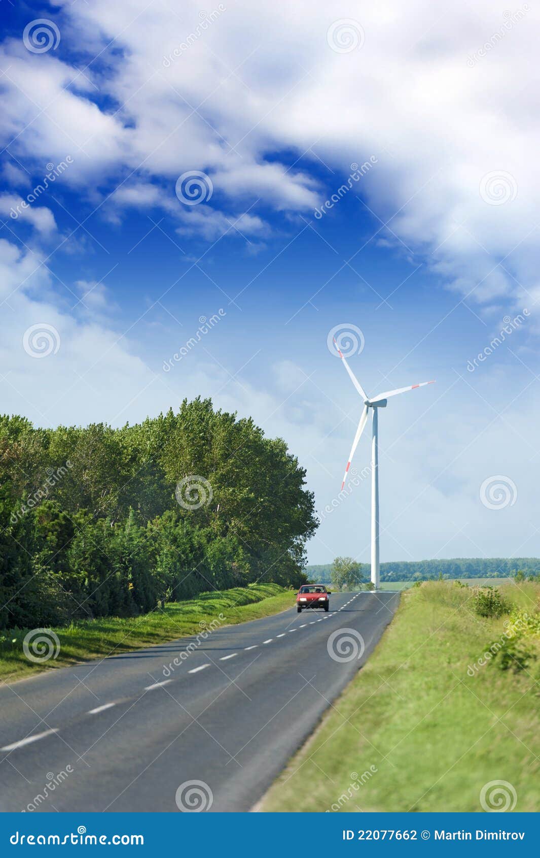 Windmill near a road stock photo. Image of generating - 22077662