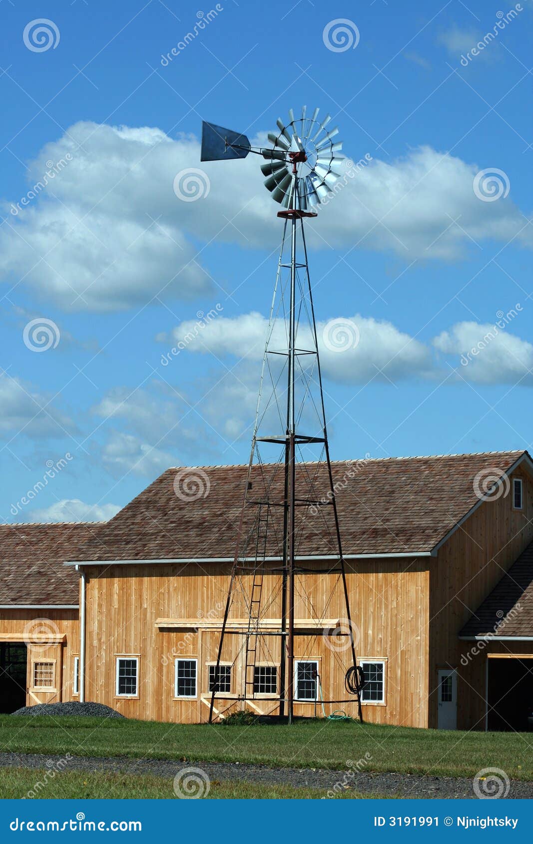 Windmill with new barn stock image. Image of agriculture - 3191991