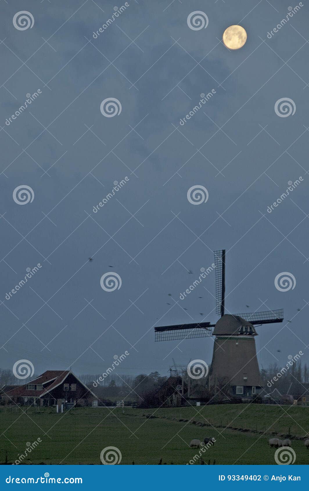 Windmill in the night stock photo. Image of night, windmills - 93349402