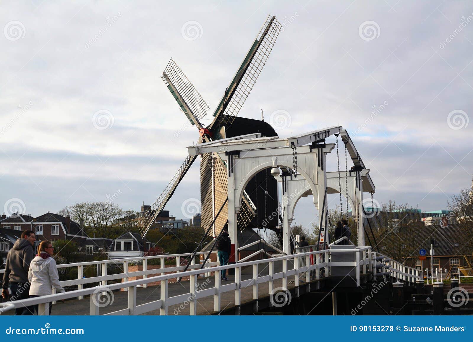 Windmill and old bridge editorial stock photo. Image of harbour - 90153278