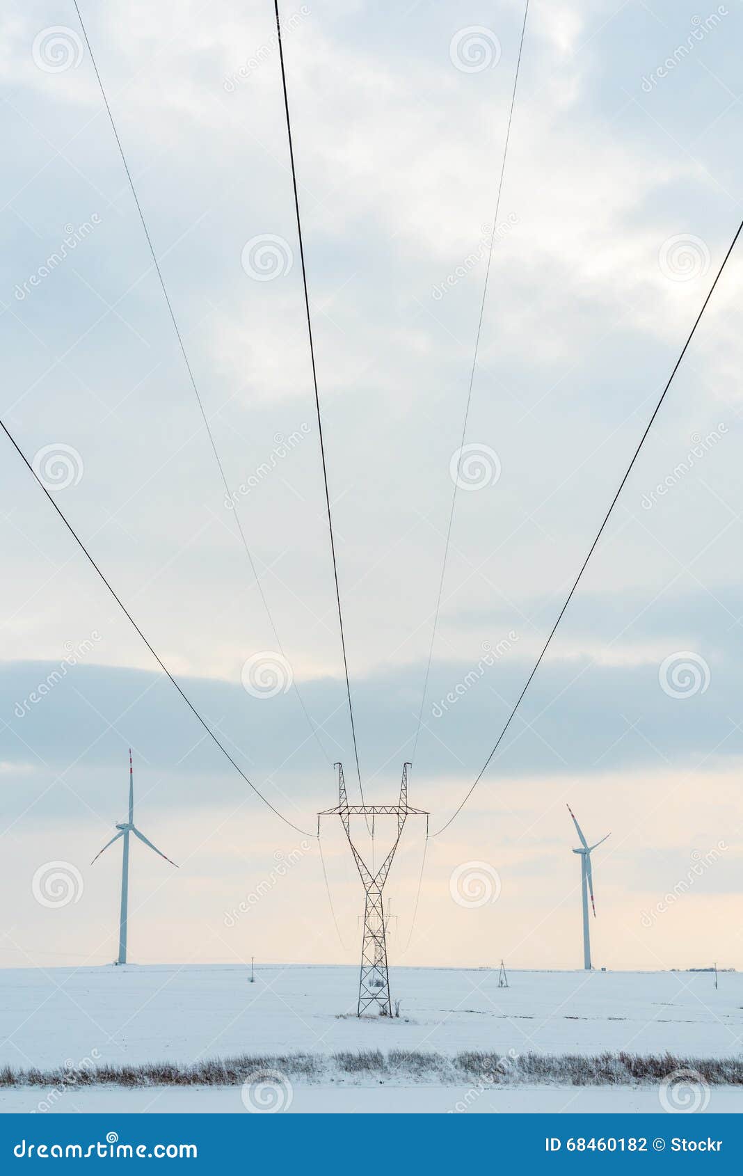 Windmill and Powerlines on the Field in Winter Stock Photo - Image of ...