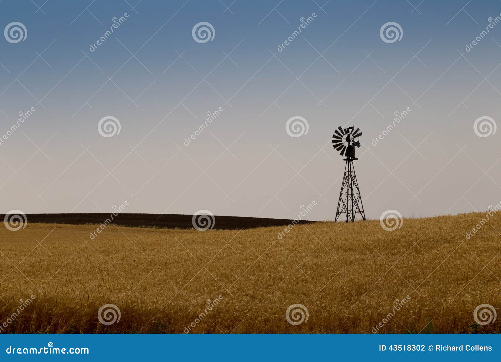Windmill on a prairie farm stock photo. Image of state - 43518302