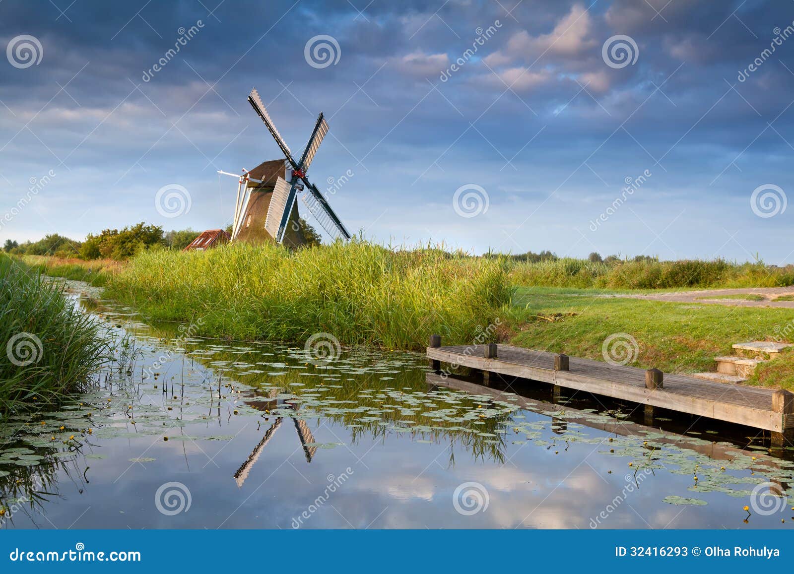 Windmill Reflected in River Stock Image - Image of outside, landscape ...