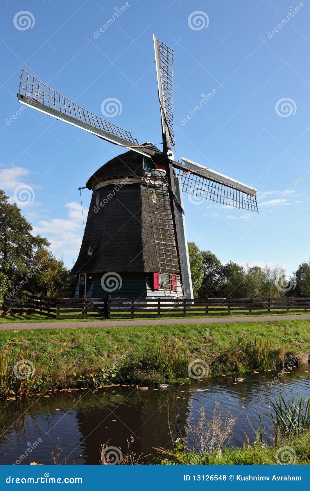 The Windmill is Reflected in Water Stock Photo - Image of europe ...