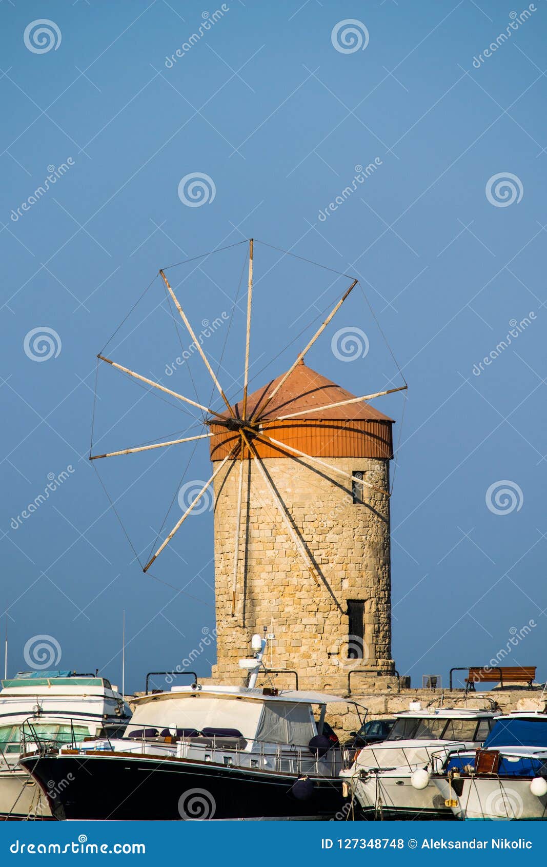 Windmill of Rhodes stock photo. Image of port, marina - 127348748