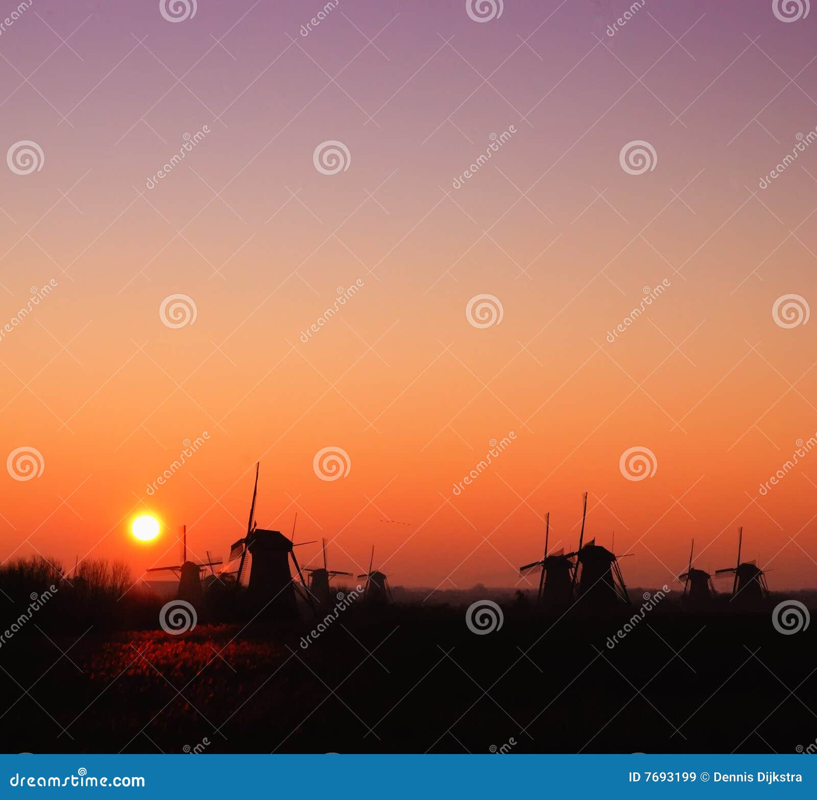 Windmill with rising sun stock image. Image of landscape - 7693199