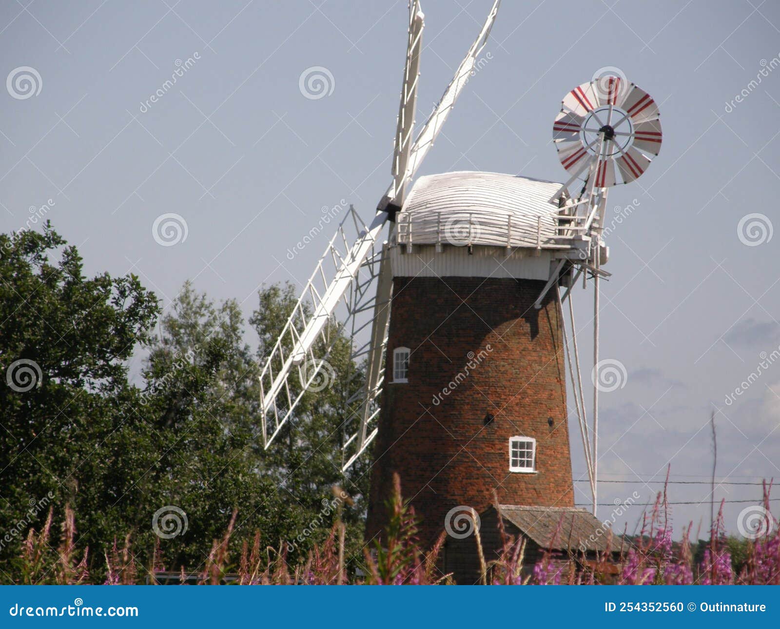 A Windmill in a Rural Countryside Setting Stock Photo - Image of sits ...