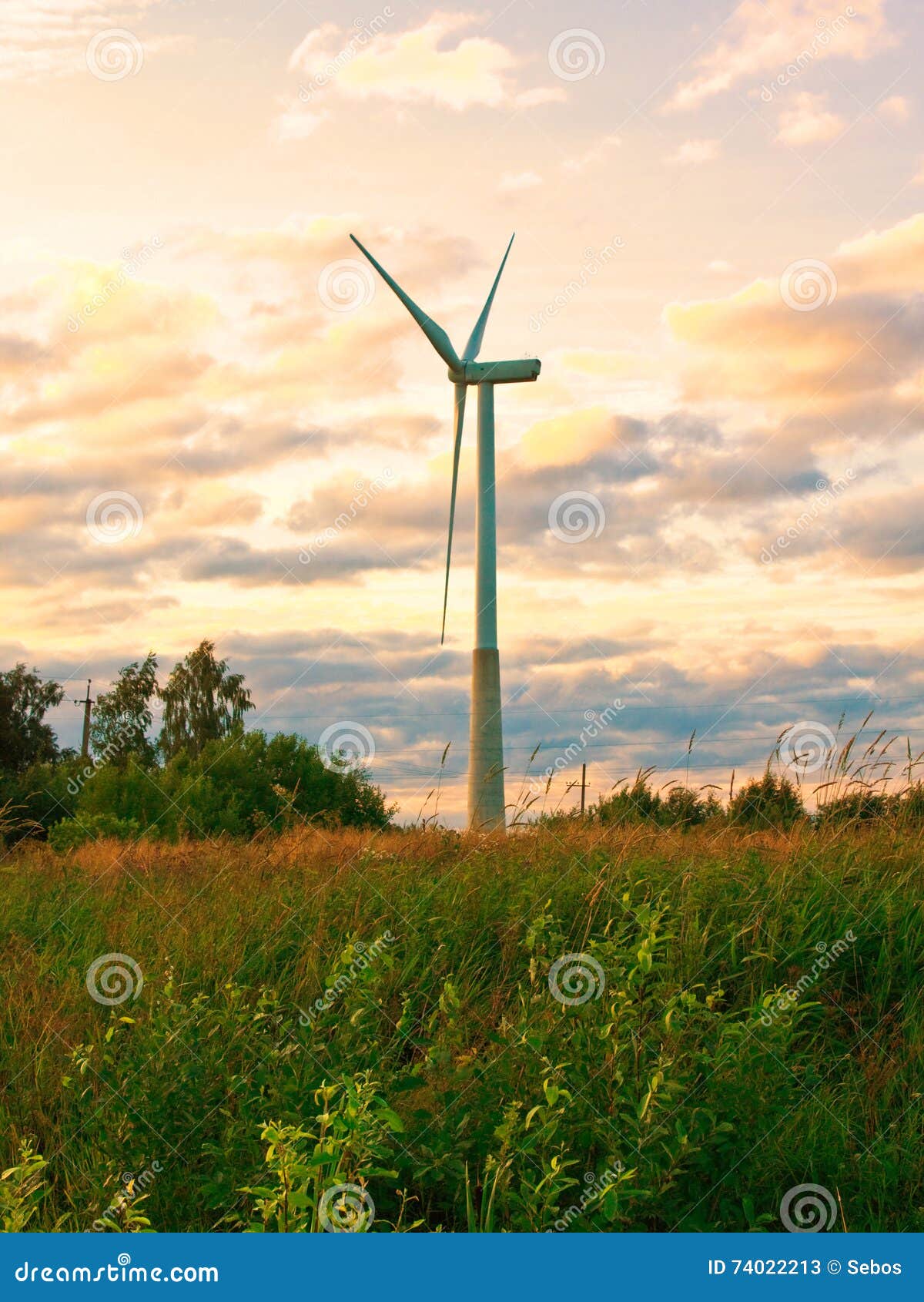 Windmill on Rural Field in the Sunset. Wind Turbines Farm Stock Image ...